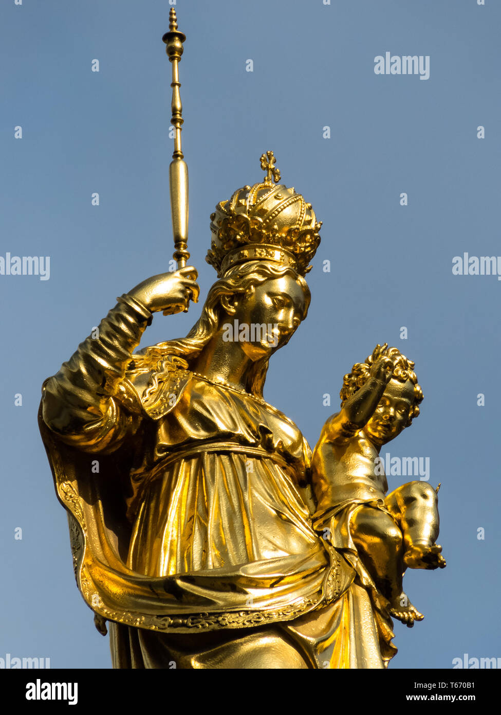 The Golden Mary's Column opposite the towers of the Cathedral of Our ...