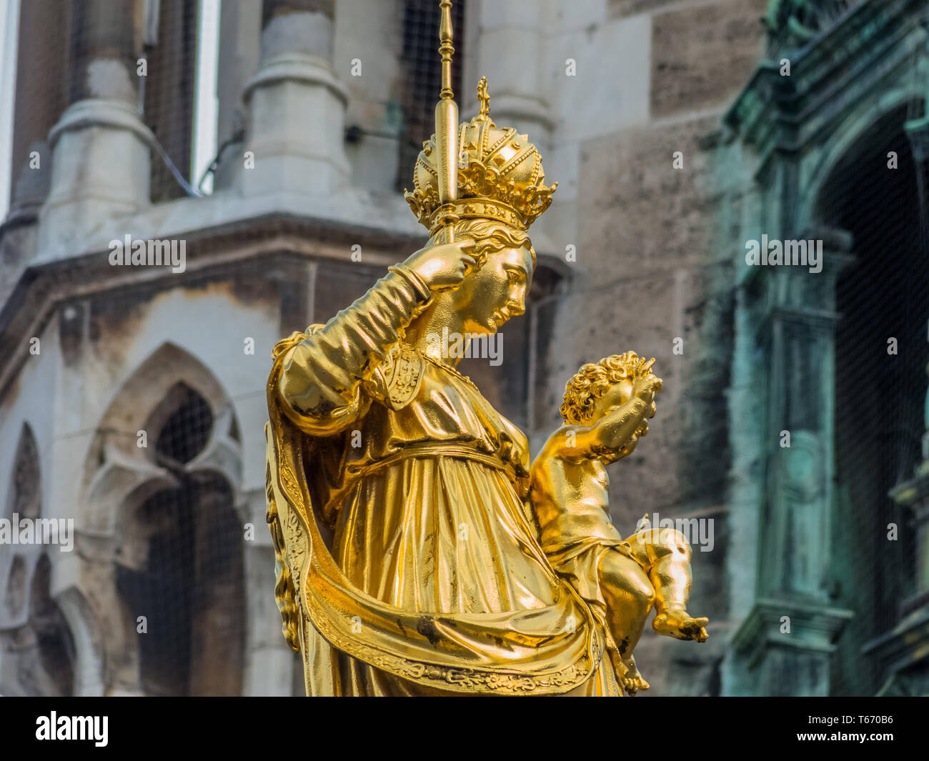 The Golden Mary's Column opposite the towers of the Cathedral of Our ...
