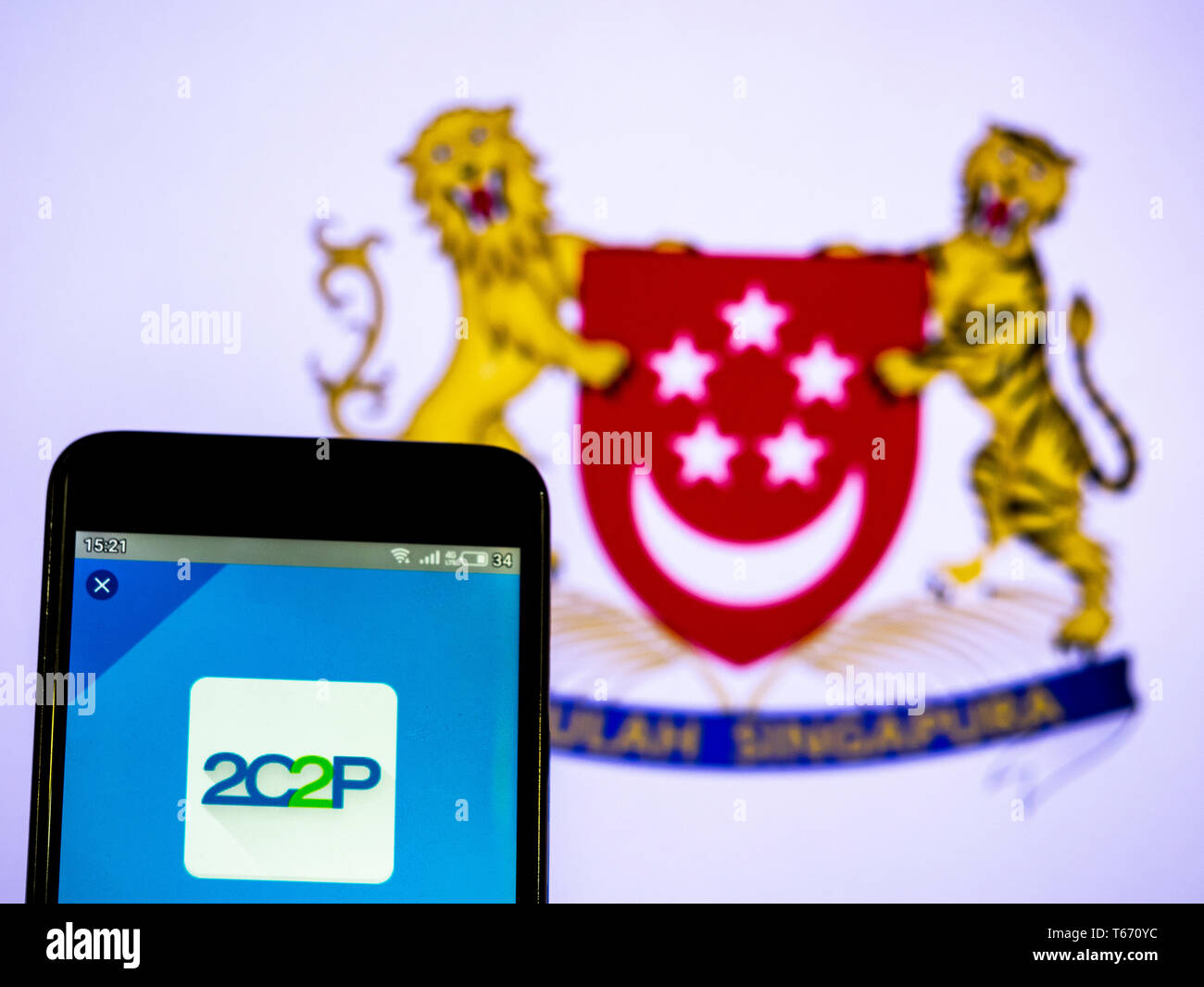 In this photo illustration a 2C2P logo seen displayed on a smart phone ...