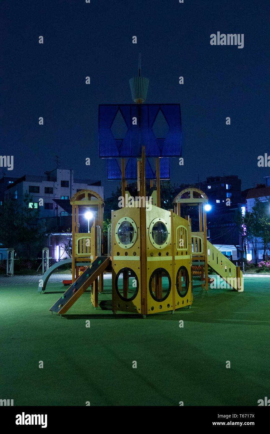 Children's playground side view Stock Photo - Alamy