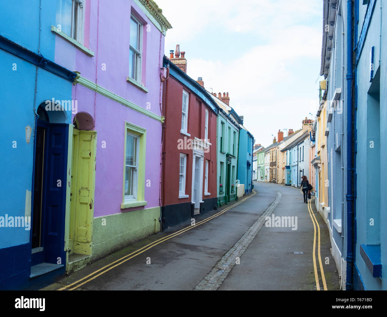 Appledore, England - March 22, 2019: Woman making her way through one ...