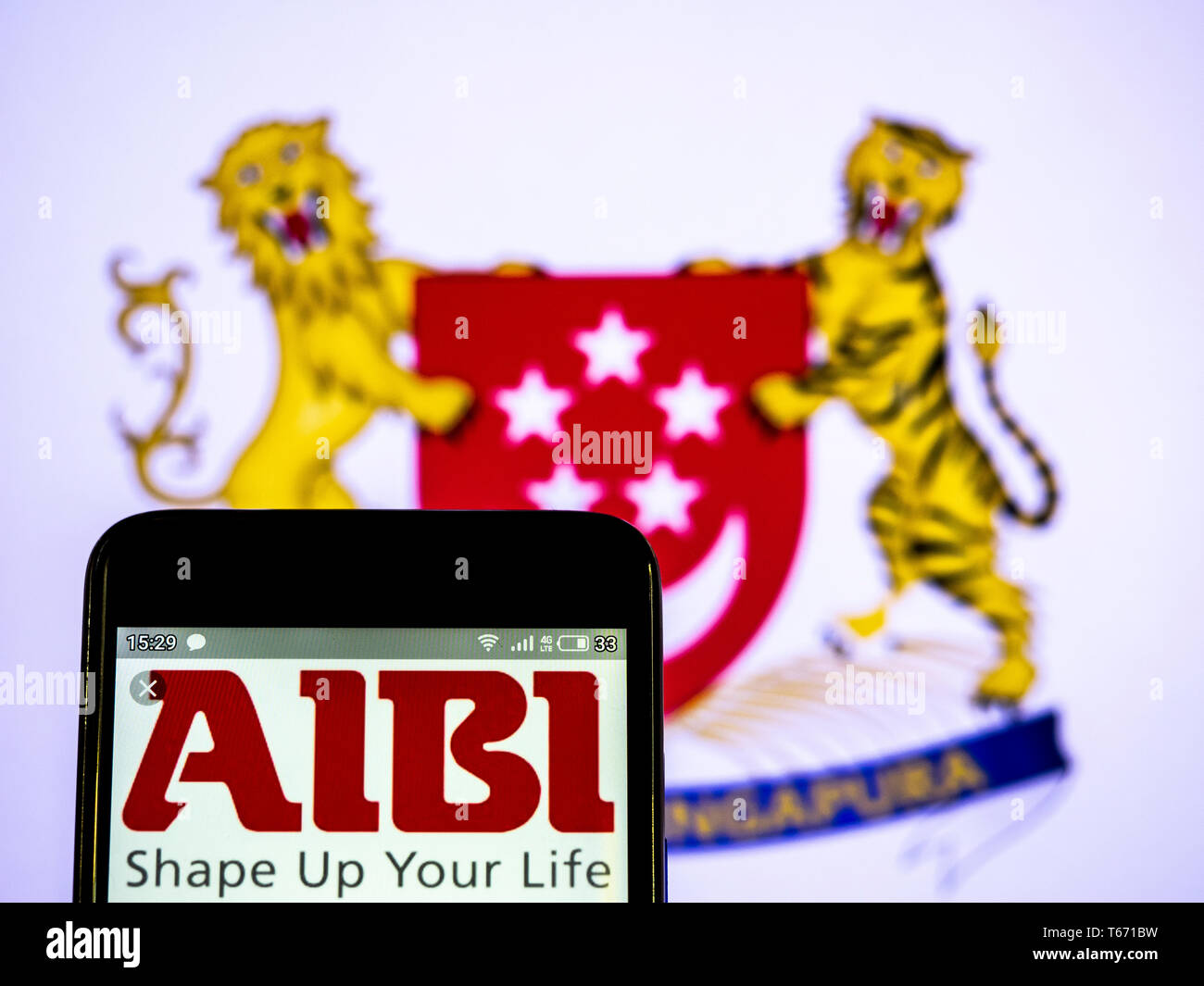 In this photo illustration an AIBI International Pte Ltd logo seen ...
