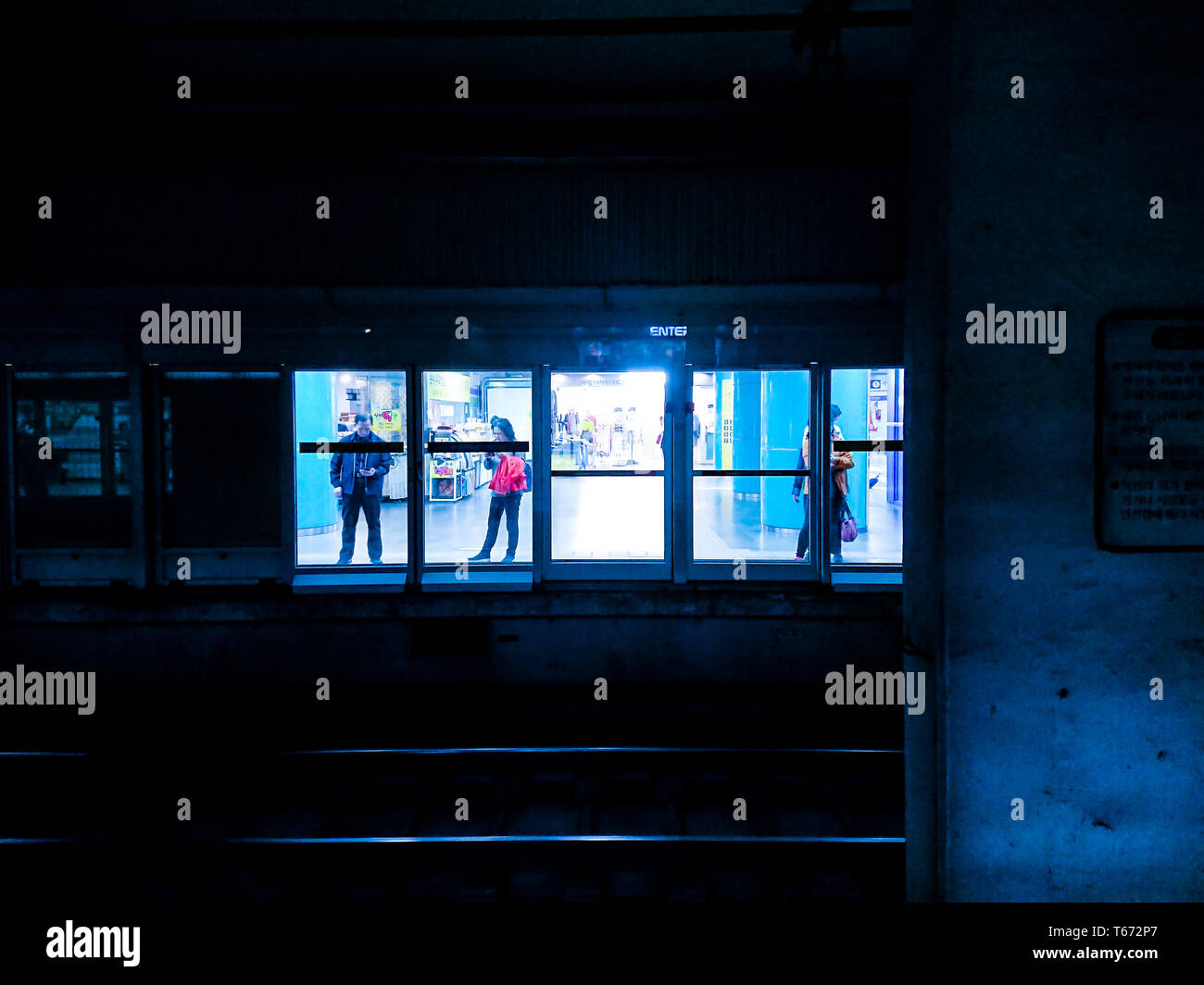 Waiting at subway Stock Photo - Alamy