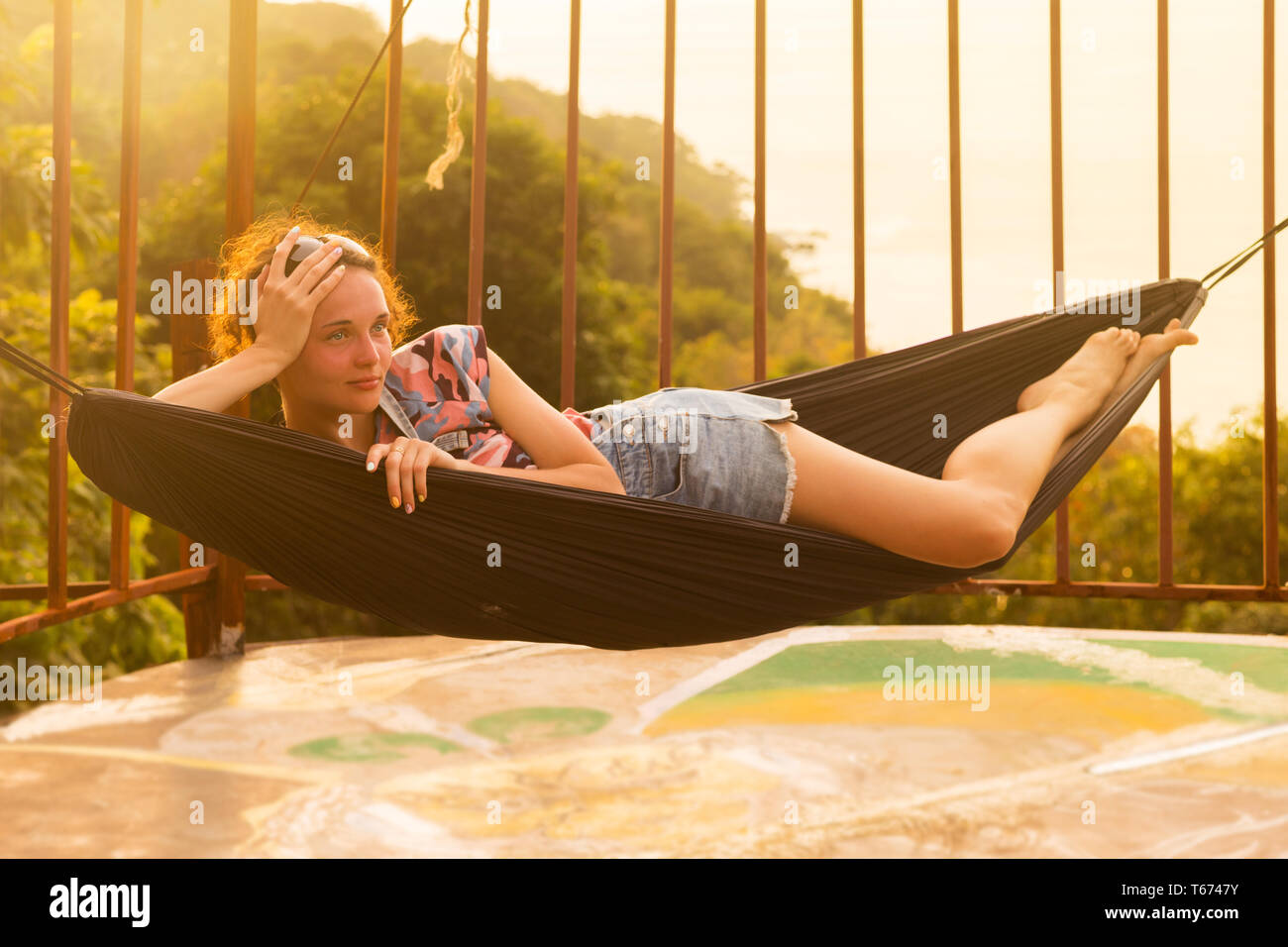 Woman hammock beach hi-res stock photography and images - Alamy