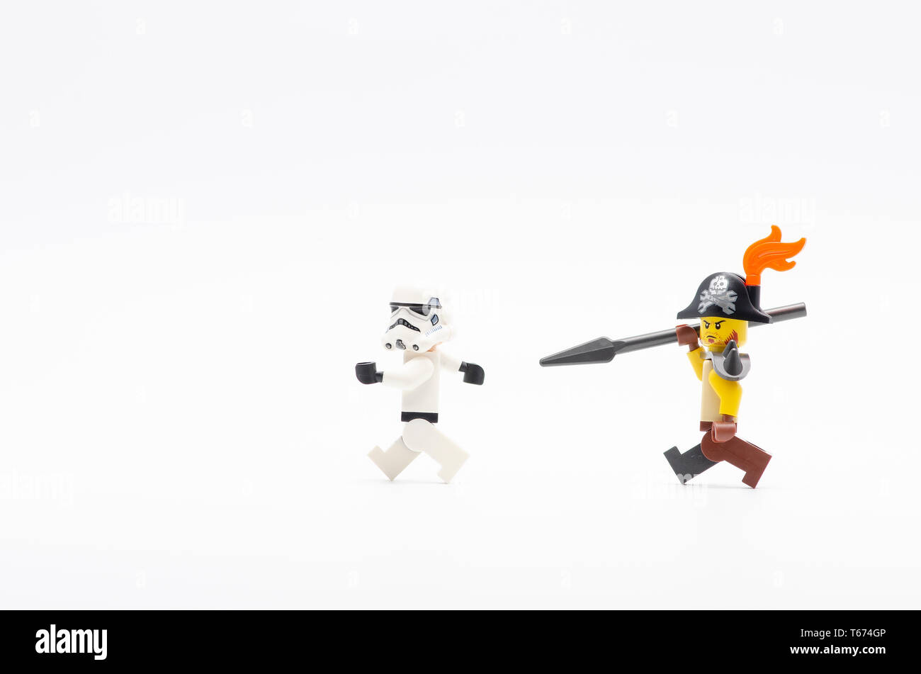 lego pirate chasing storm trooper. Lego minifigures are manufactured by ...