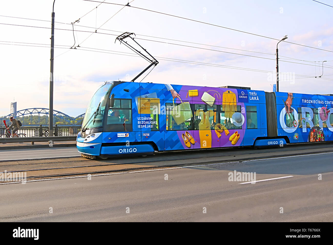 RIGA, LATVIA - AUGUST 29, 2018: View of new tram on the Stone bridge ...