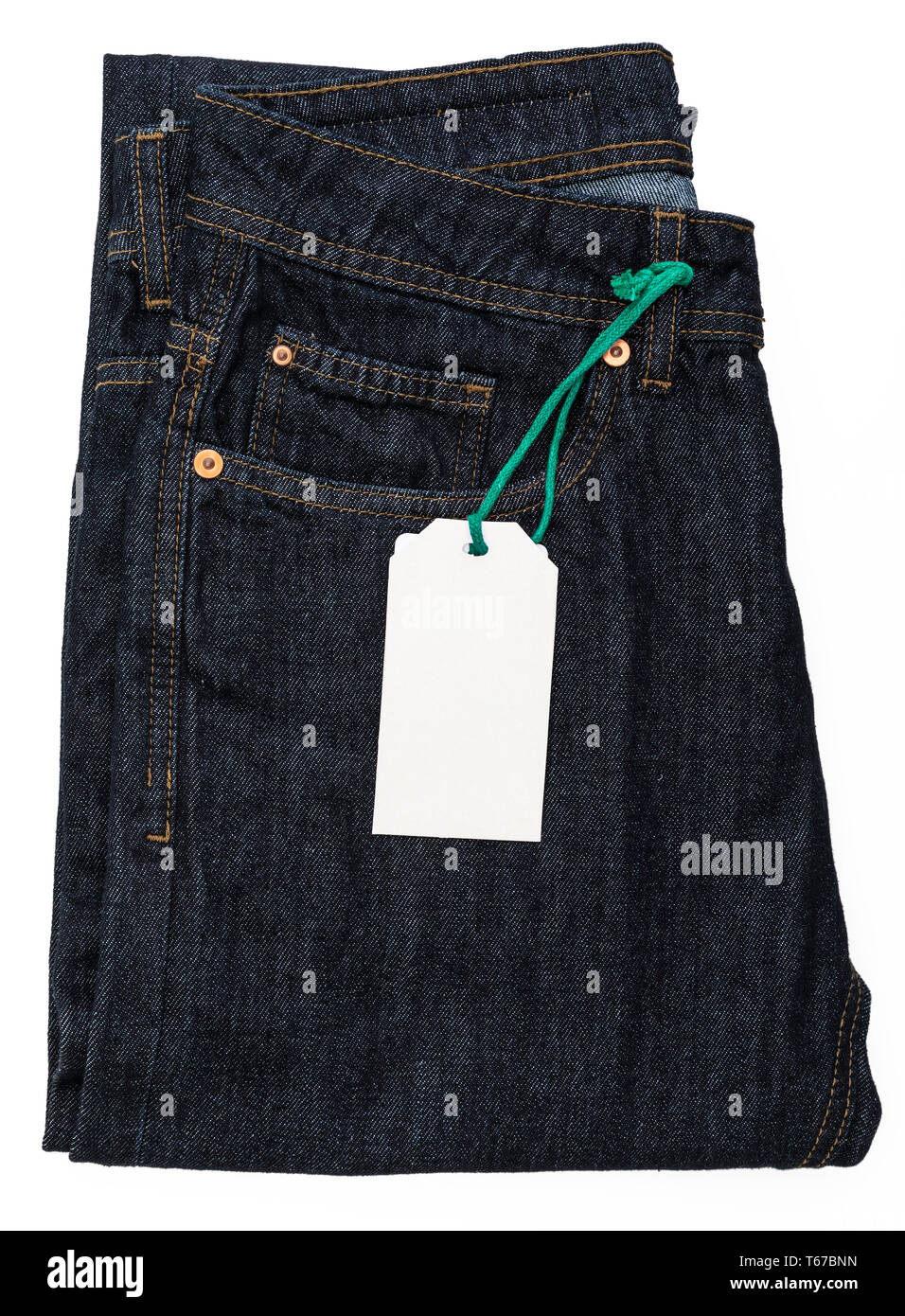 Dark blue jeans with tag. Isolated on white background Stock Photo - Alamy