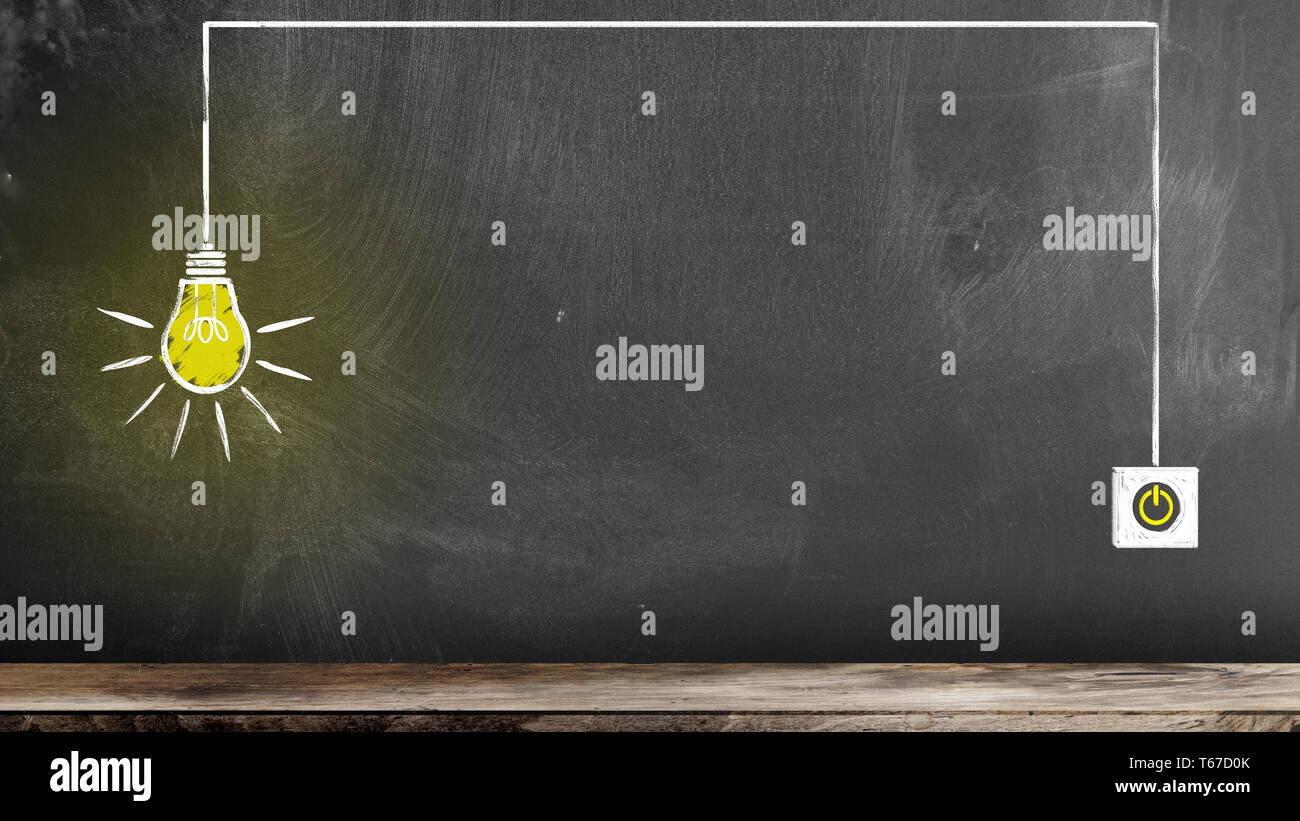 chalk drawing of glowing light bulb and switch on blackboard ...