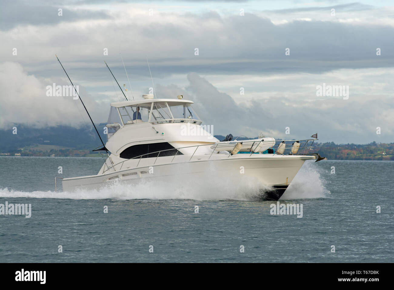 Riviera Launch "RUNAWAY" at Speed on the Hauraki Gulf NZ Stock Photo ...