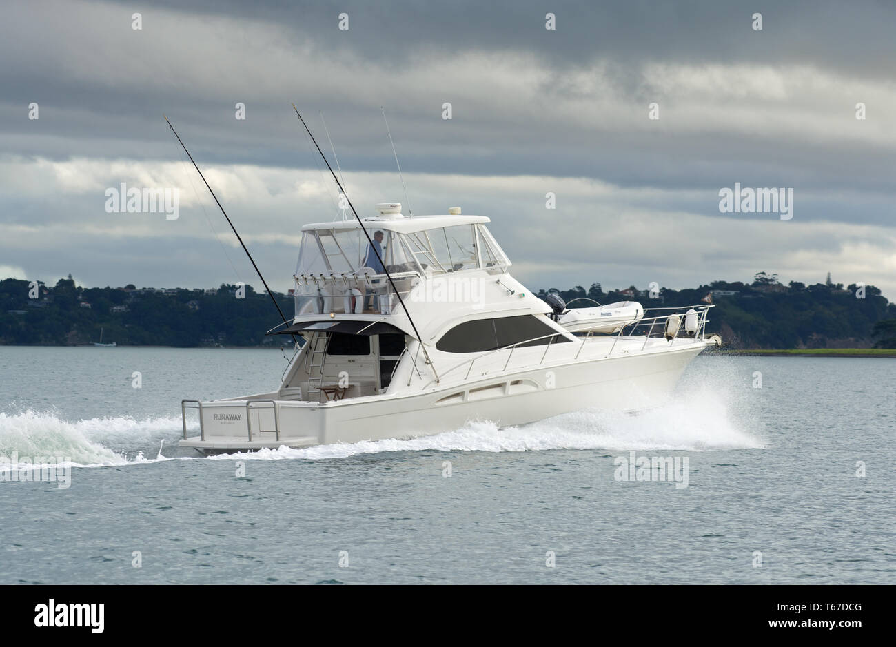 Riviera Launch "RUNAWAY" at Speed on the Hauraki Gulf NZ Stock Photo ...