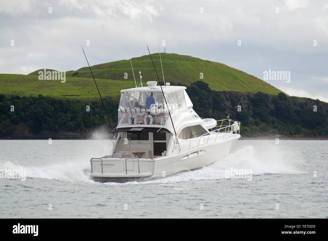 Riviera Launch "RUNAWAY" at Speed on the Hauraki Gulf NZ Stock Photo ...