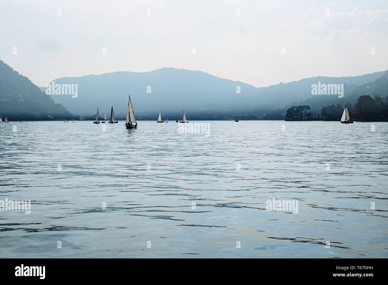 yacht at lake, Como lake view, autumn in Como. Sailing boats on Como ...