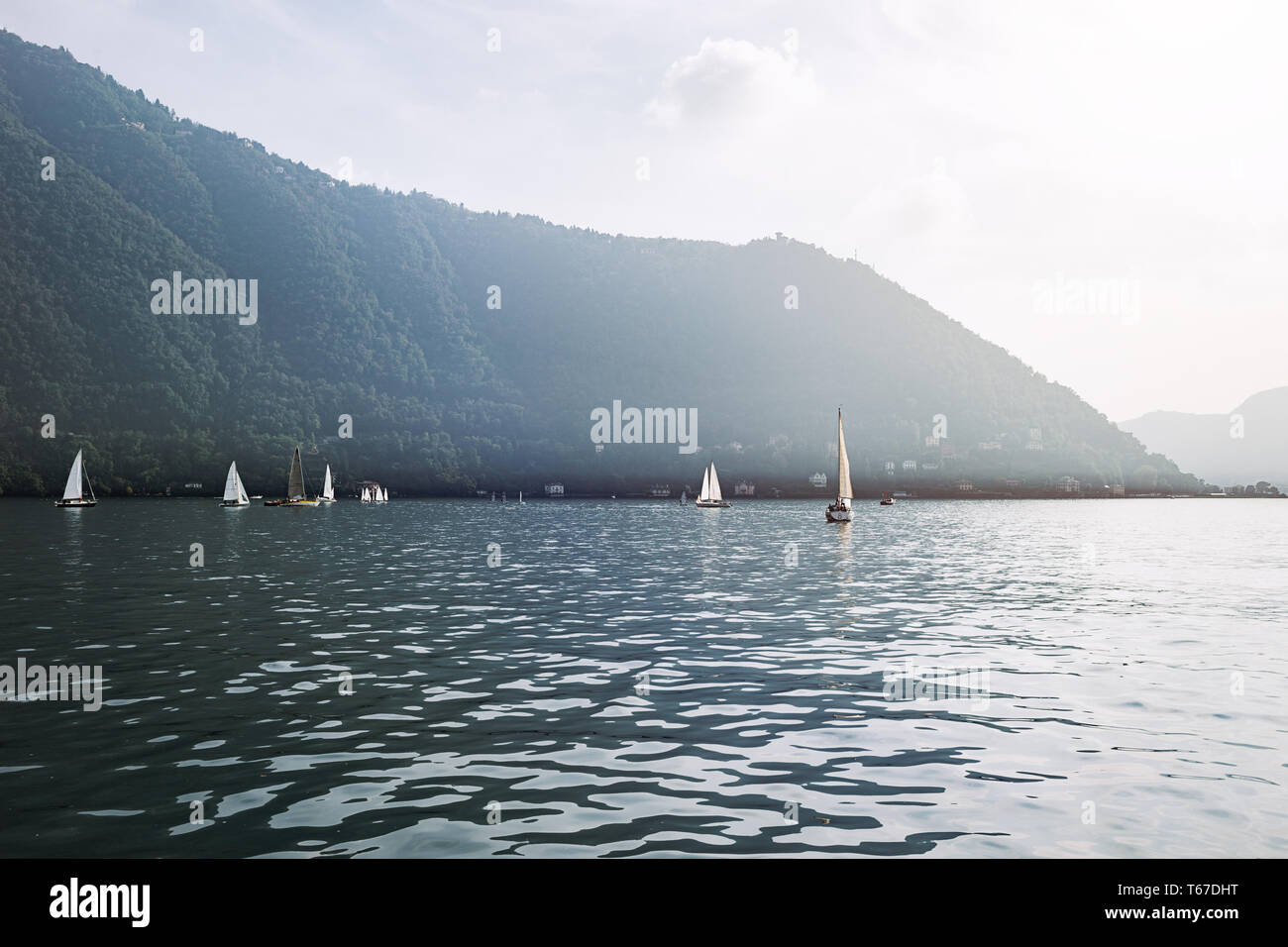yacht at lake, Como lake view, autumn in Como. Sailing boats on Como ...
