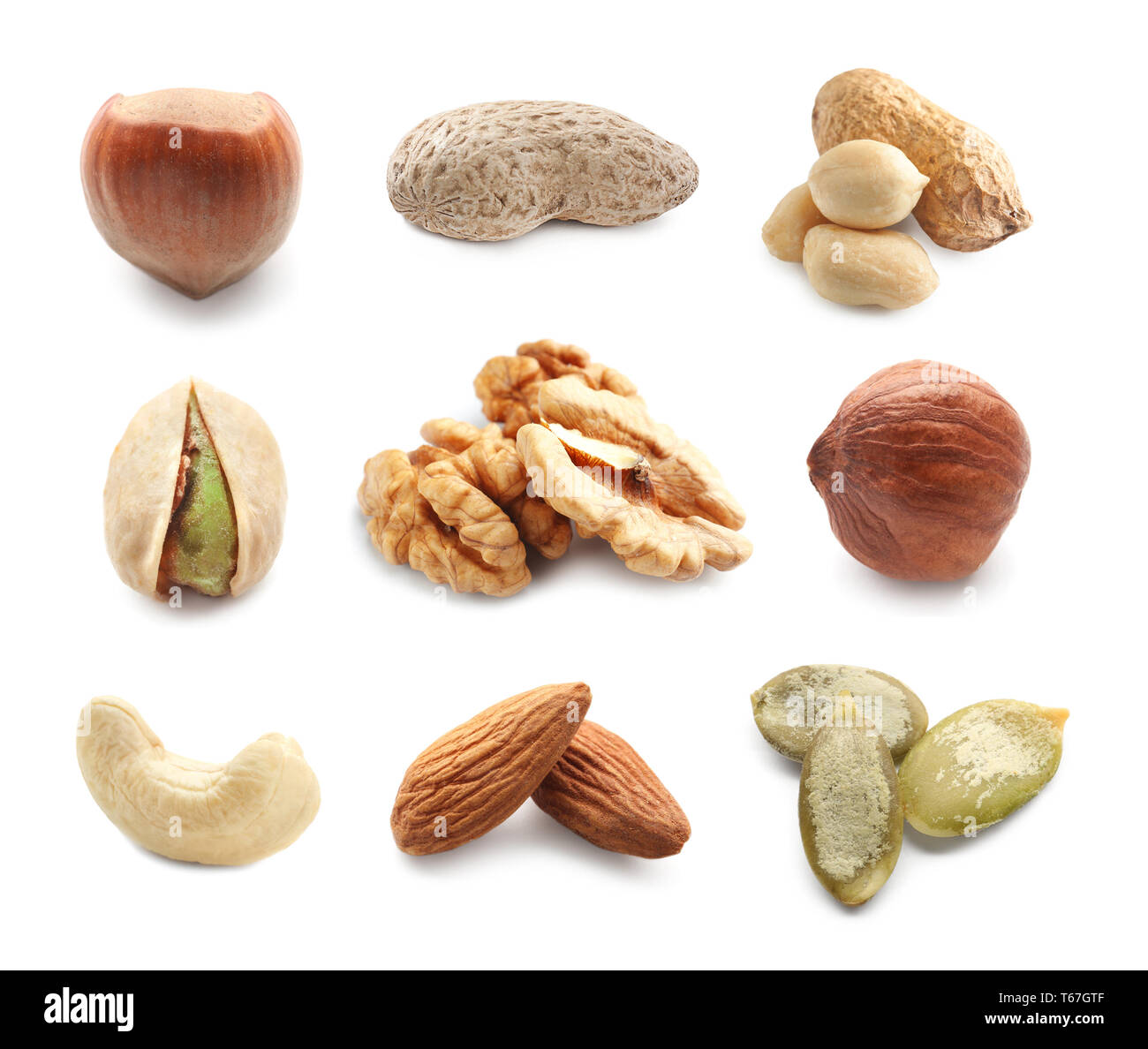 Assortment of tasty nuts on white background Stock Photo - Alamy