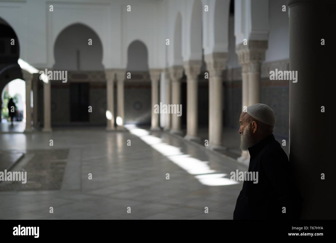 An old Muslim man standing in a temple Stock Photo - Alamy