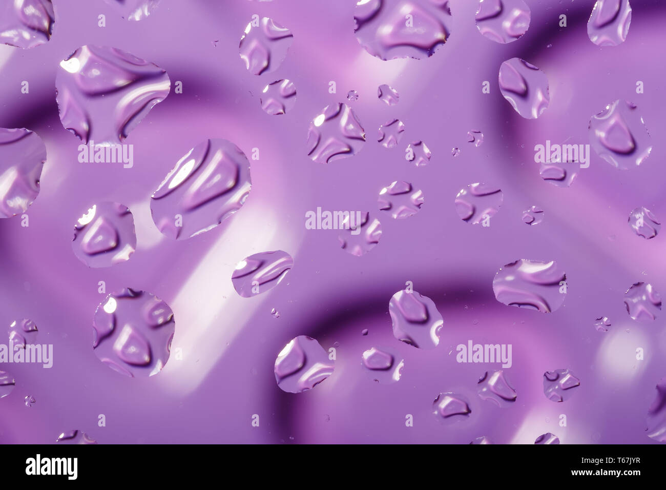 violet abstract background with water drops Stock Photo - Alamy