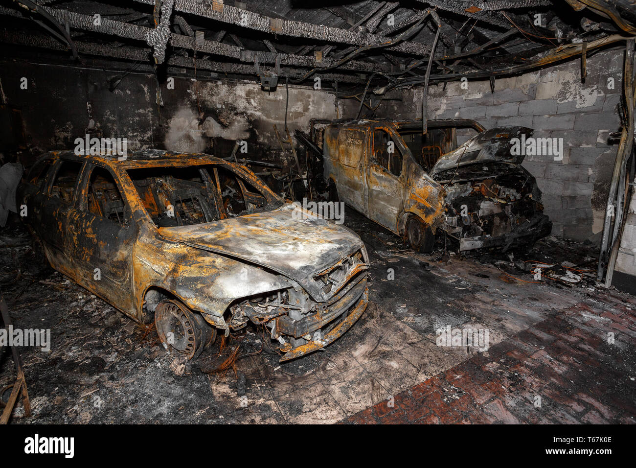 Close up photo of a burned out cars Stock Photo - Alamy