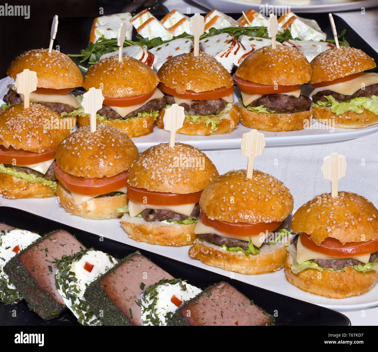 Mini Burgers in a Row Stock Photo - Alamy