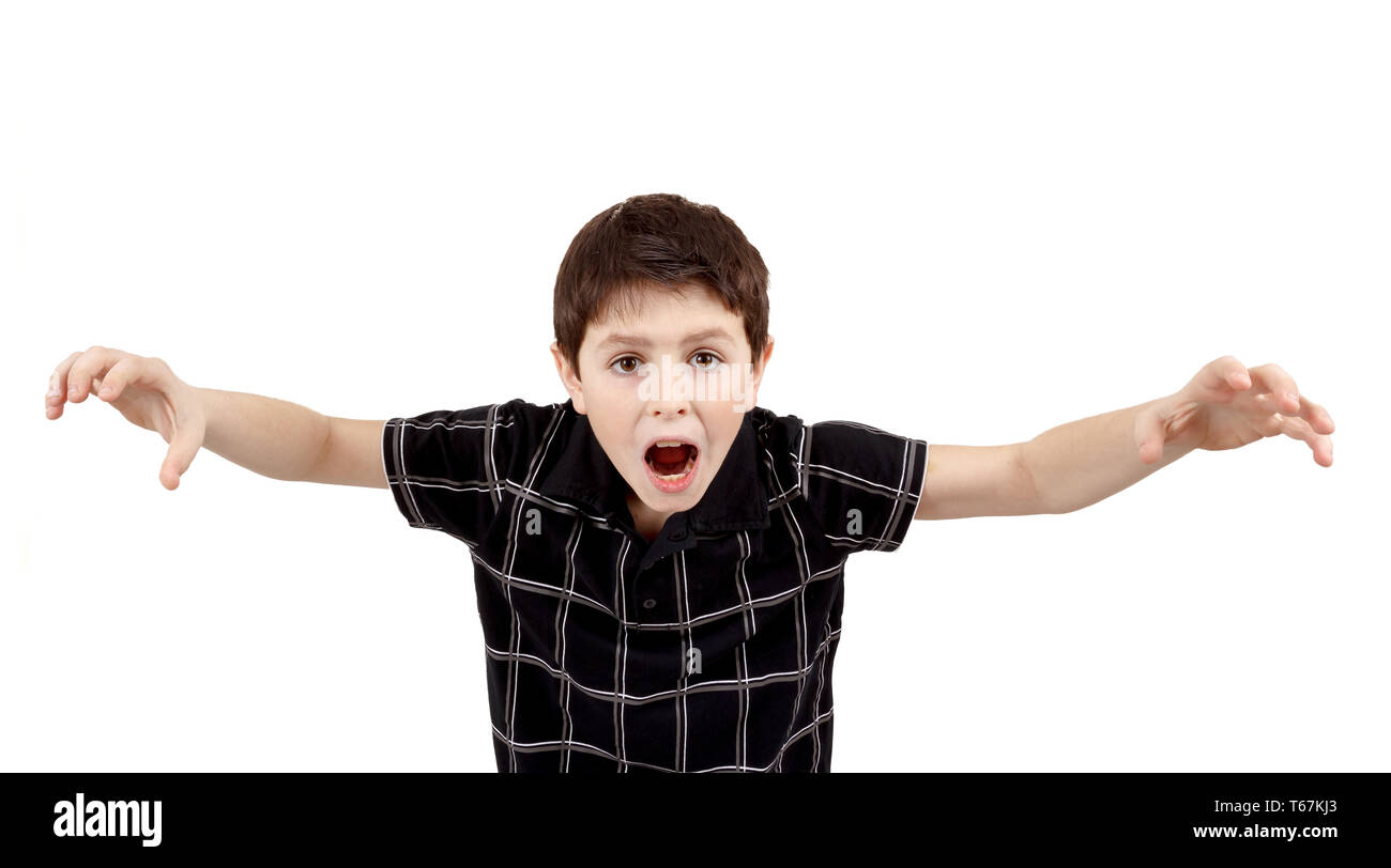 Young boy grimacing Stock Photo - Alamy