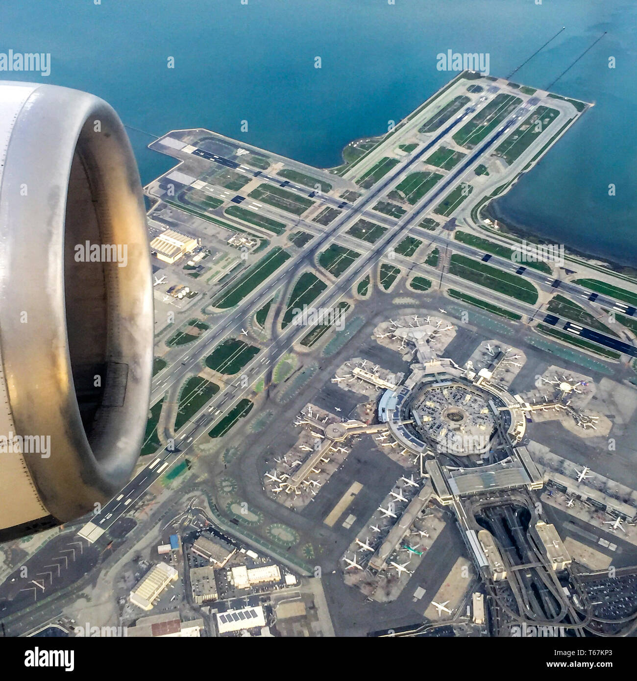 Flying high above the SFO San Francisco Airport. Air traffic is ...