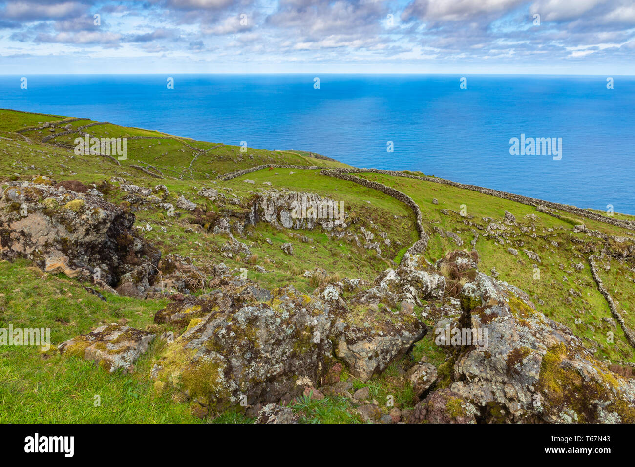 Hill of farm fields in the Corvo island in Azores, Portugal Stock Photo ...