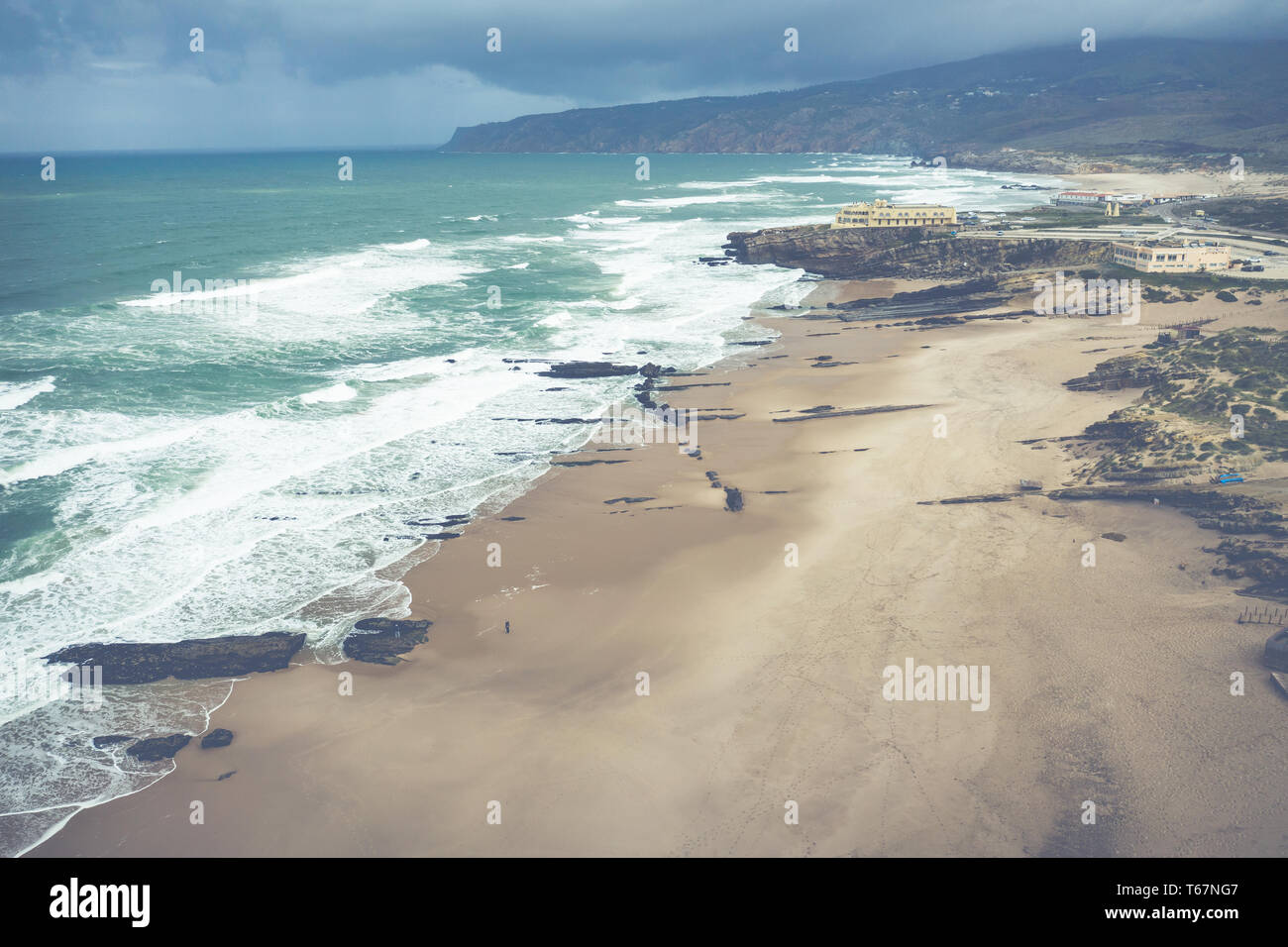 Aerial view of famous Guincho Beach in Cascais near Lisbon, Portugal. Photo made from above by ...