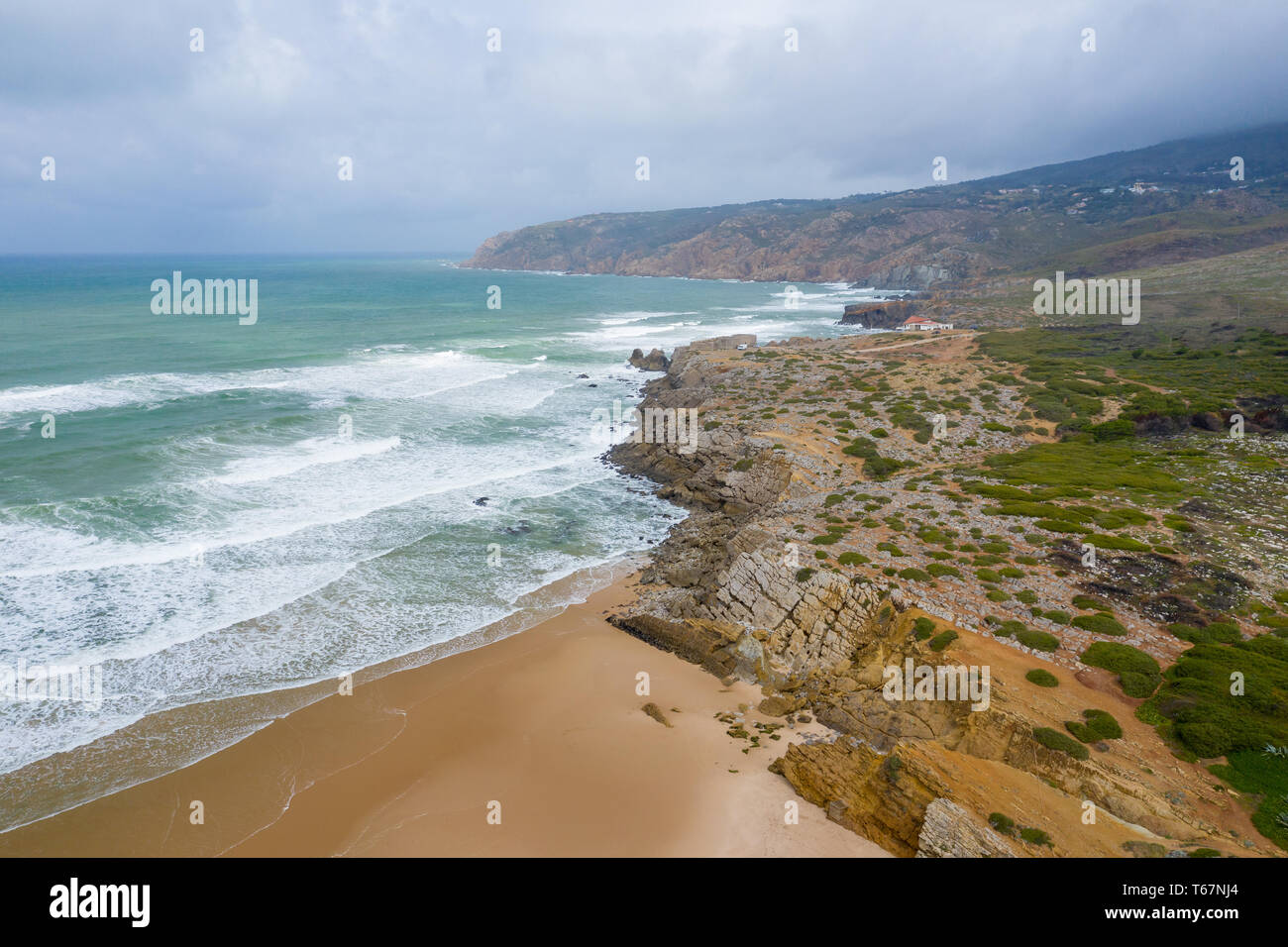 Aerial view of famous Guincho Beach in Cascais near Lisbon, Portugal. Photo made from above by ...