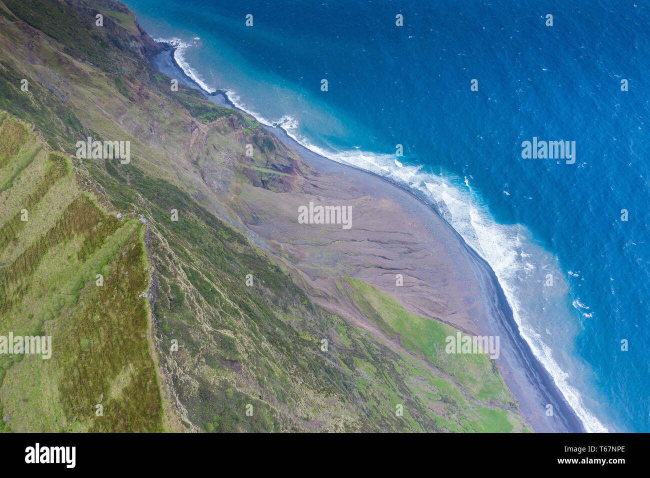 Aerial view of volcanic crater (Caldeirao) with a beautiful lake on the ...