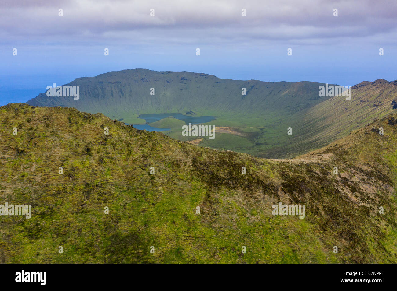 Aerial view of volcanic crater (Caldeirao) with a beautiful lake on the ...