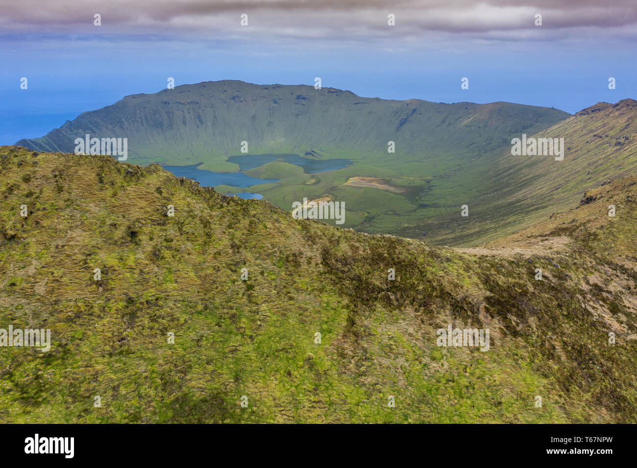 Aerial view of volcanic crater (Caldeirao) with a beautiful lake on the ...
