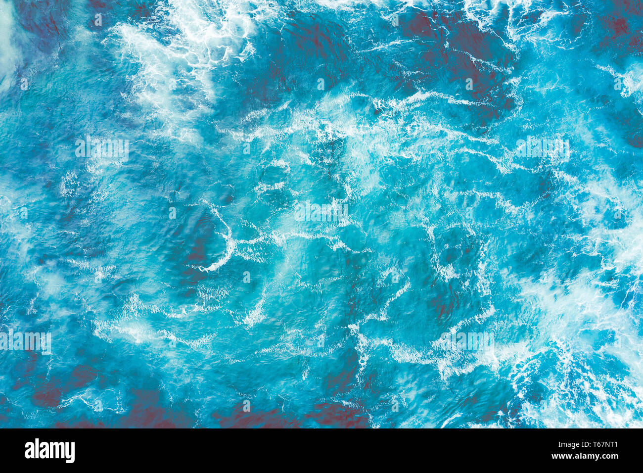 Aerial view to ocean waves. Blue water background. Photo made from ...