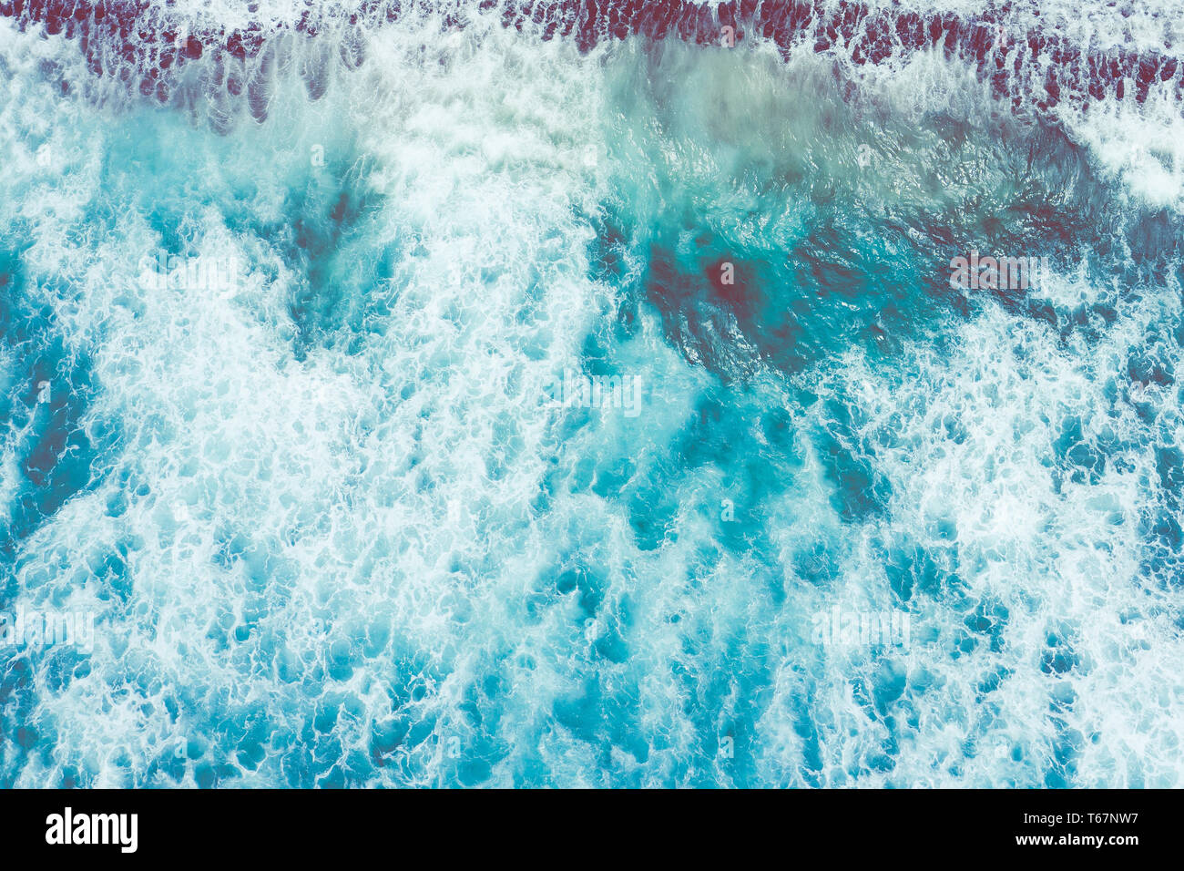 Aerial view to ocean waves. Blue water background. Photo made from ...