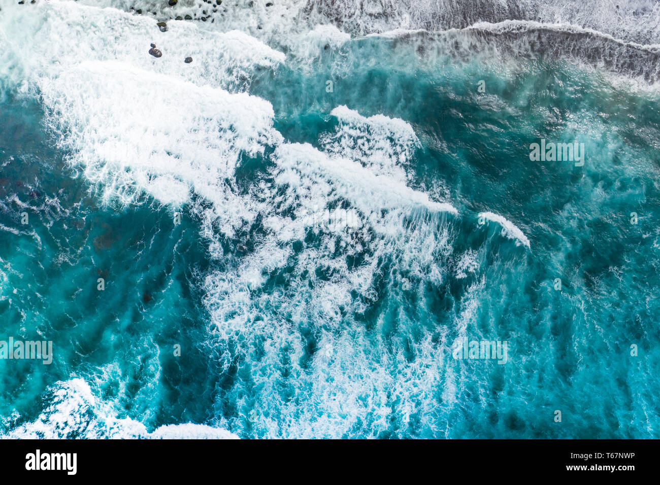 Aerial view to ocean waves. Blue water background. Photo made from ...