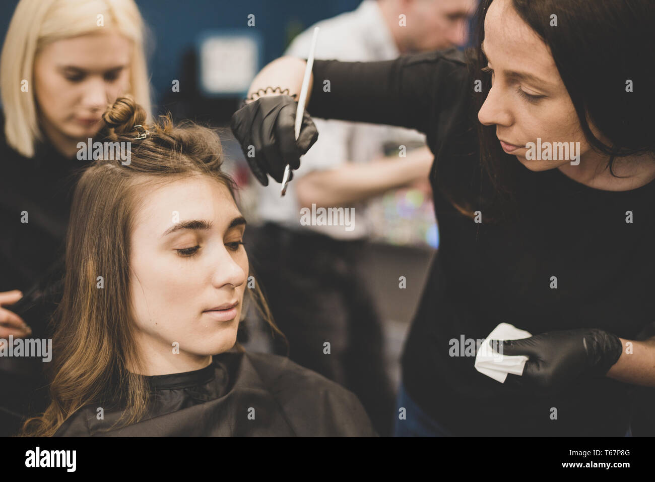 Professional Make Up Artist Doing Make Up In Beauty Salon. Eyebrow ...