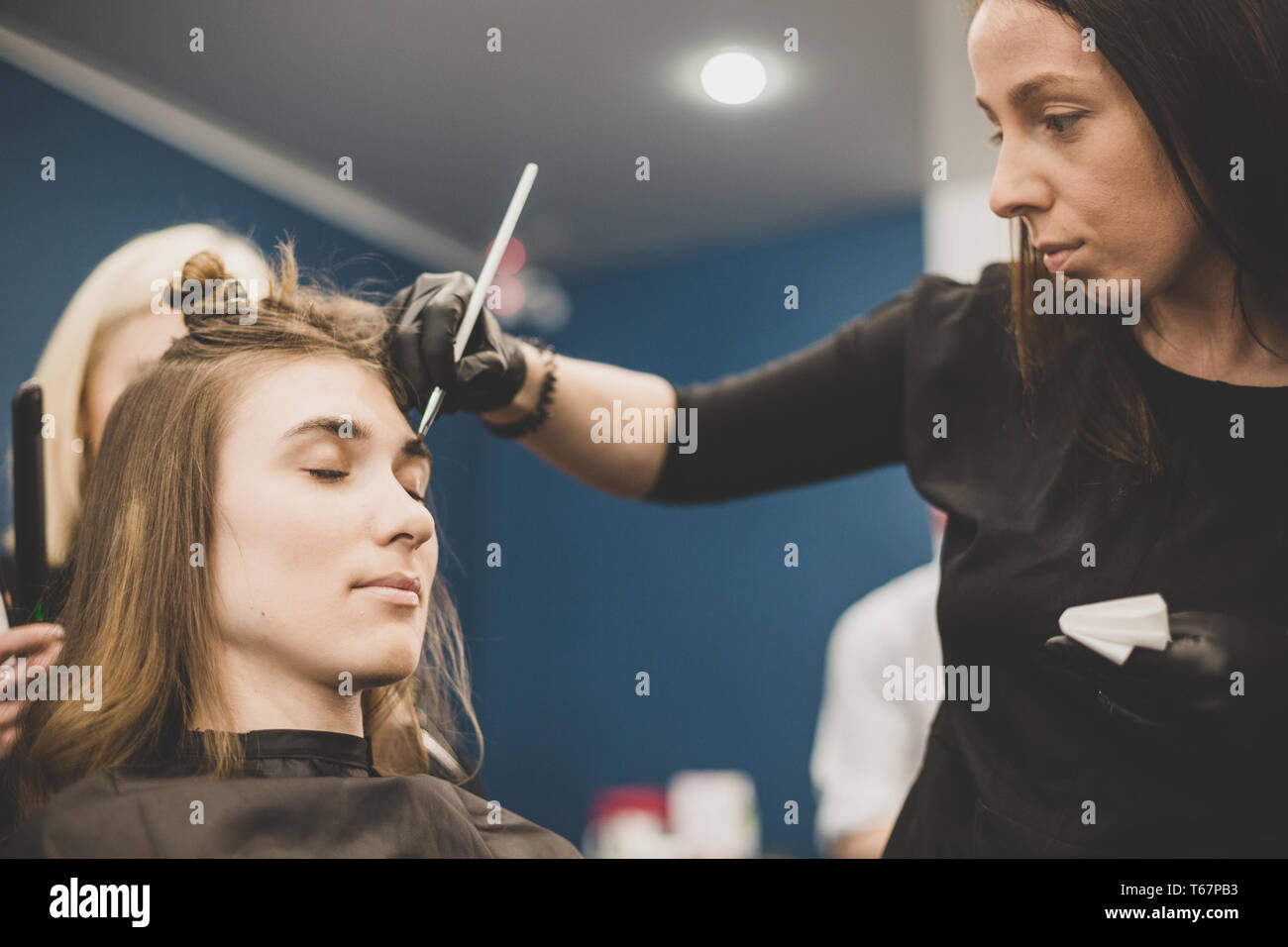 Professional Make Up Artist Doing Make Up In Beauty Salon. Eyebrow ...