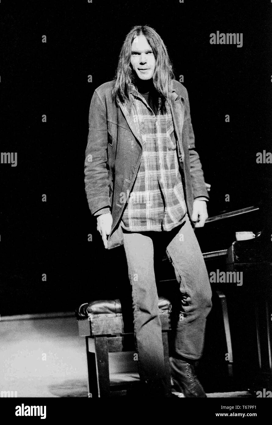 Neil Young live performance Stock Photo - Alamy