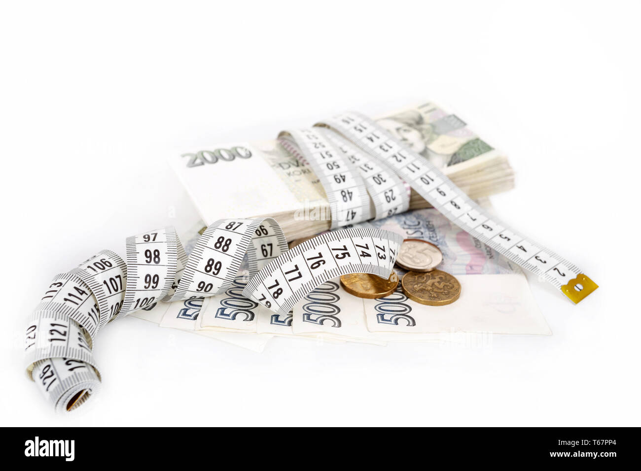 money concept of expensive bill with measurement tape Stock Photo - Alamy