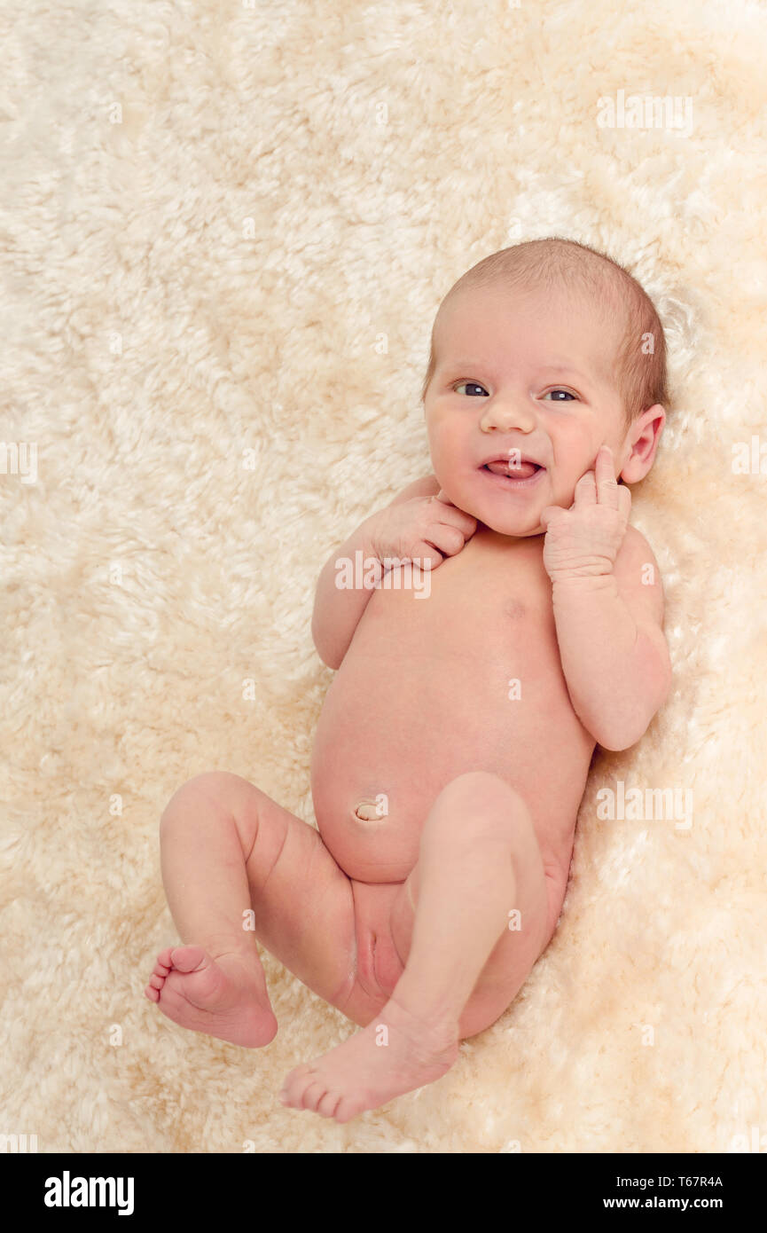 smiling newborn baby Stock Photo - Alamy