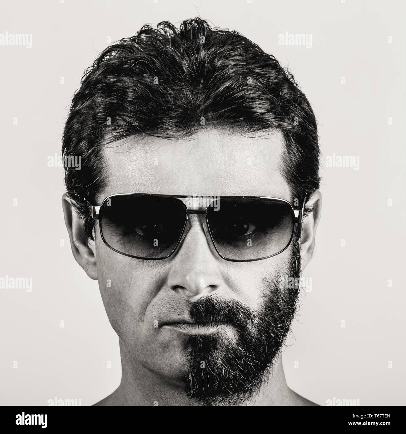 split personality - portrait of man with half shaved face Stock Photo ...