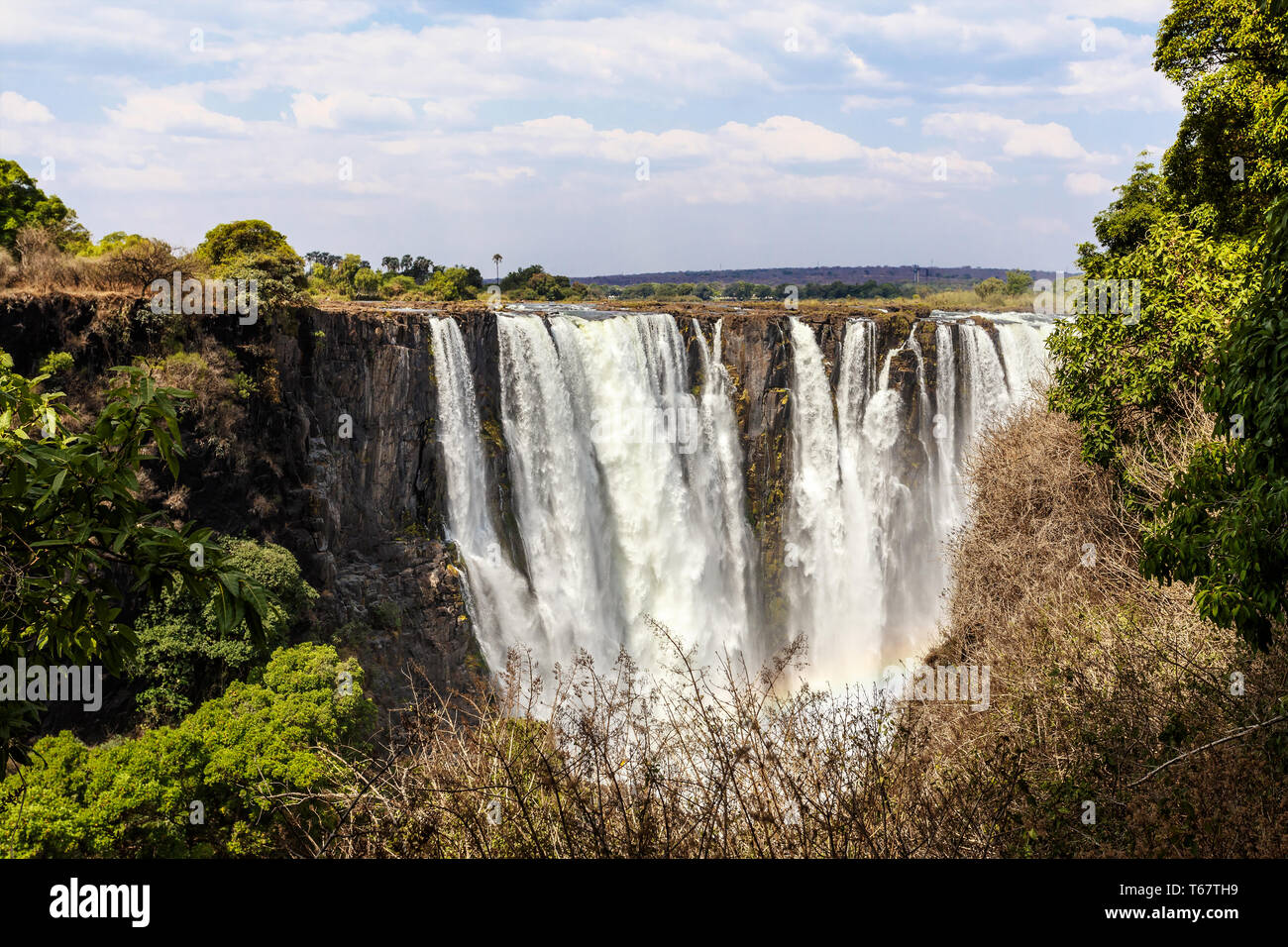 The Victoria falls with mist from water Stock Photo - Alamy