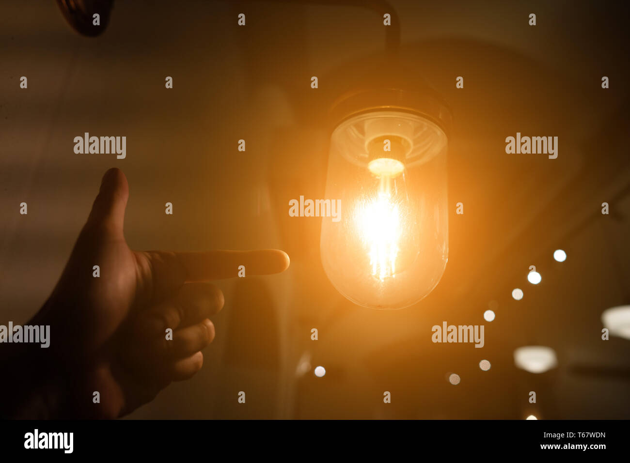 Hand Reaching For Glowing Globe High Resolution Stock Photography and ...