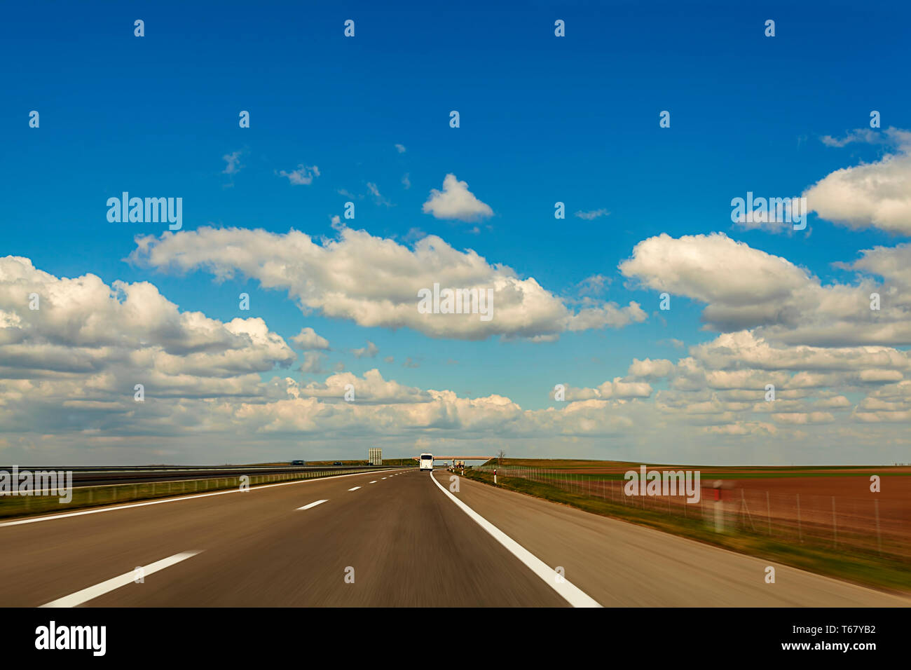 Abstract speed motion on highway background image through countryside ...