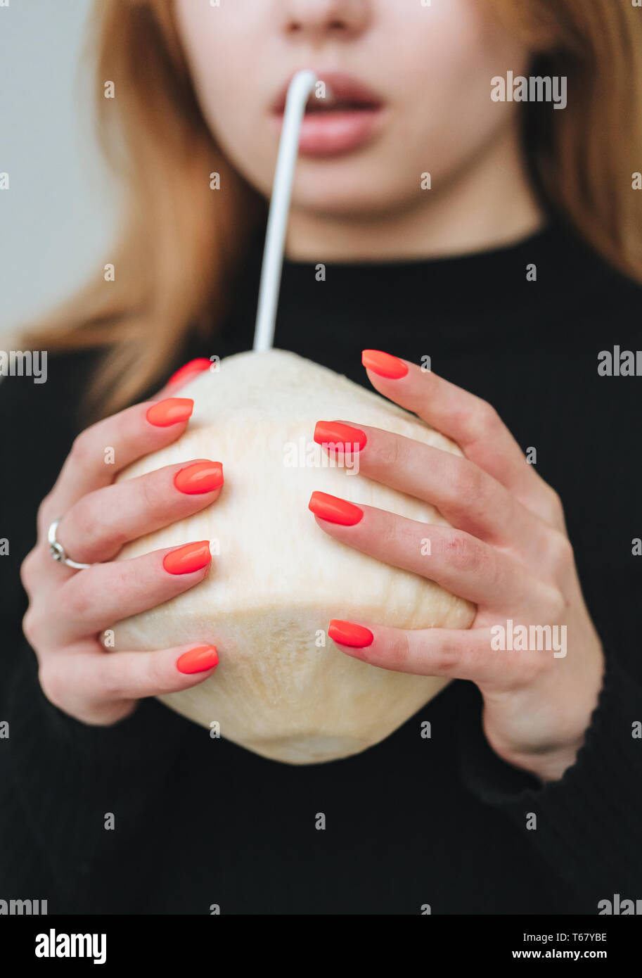 Portrait of a pretty smiling woman posing isolated Stock Photo - Alamy