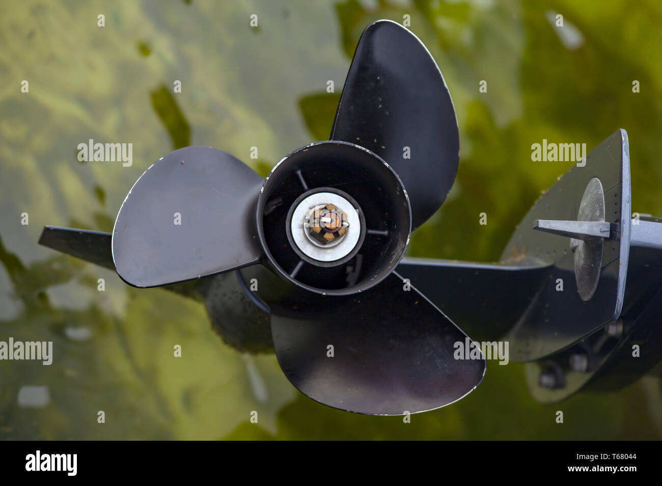 Close-up view of a black propeller over the water at lake Tota, the ...