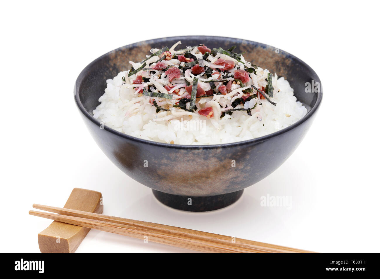 Japanese food, Shirasu and umeboshi on cooked white rice on white ...