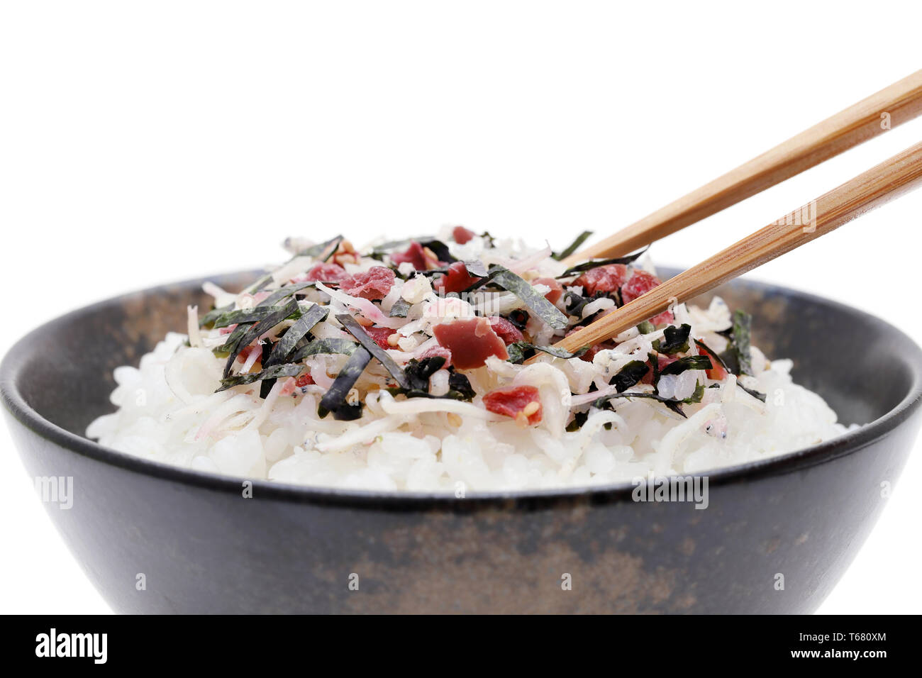 Japanese food, Shirasu and umeboshi on cooked white rice on white ...