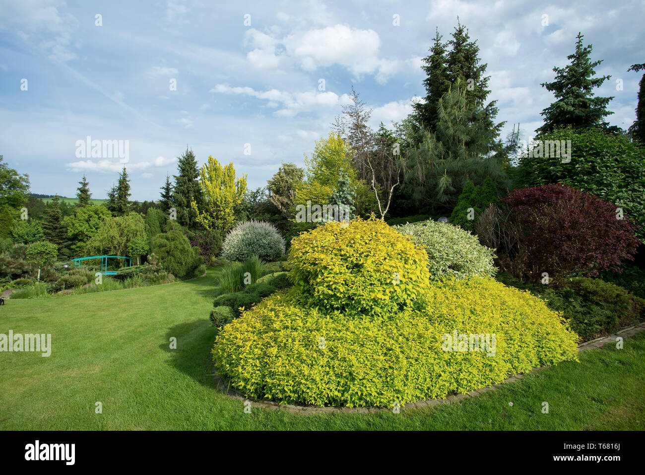 Beautiful spring garden design Stock Photo - Alamy