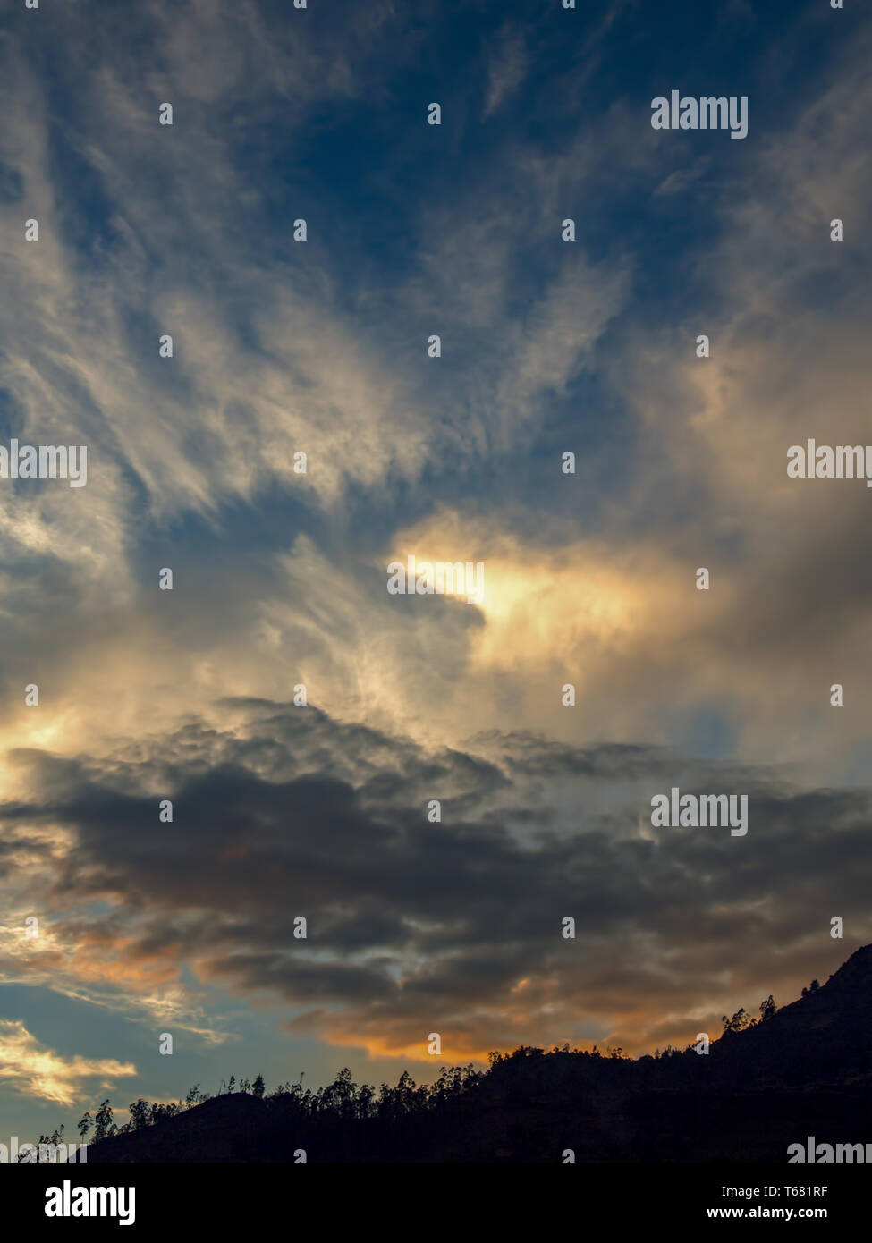 Astonishing cirrus clouds formation at sunset over the Andean mountains ...