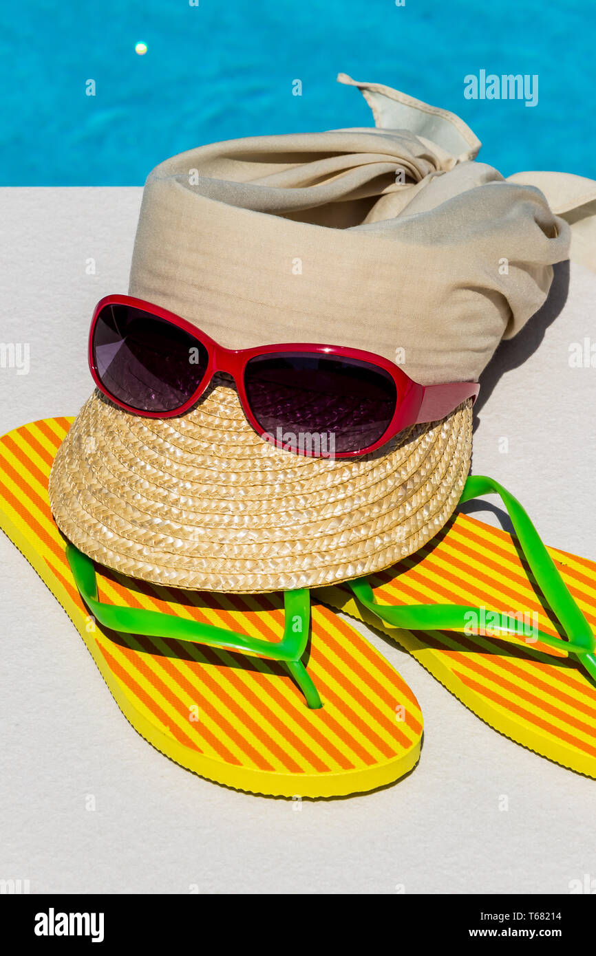 Vacation Symbol Photo of a Sun Hat at the Pool Stock Photo - Alamy