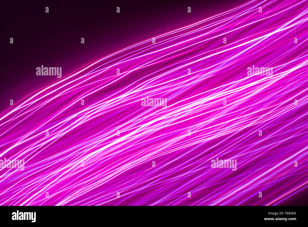 Moving neon lights abstract background. Long exposure shot Stock Photo ...